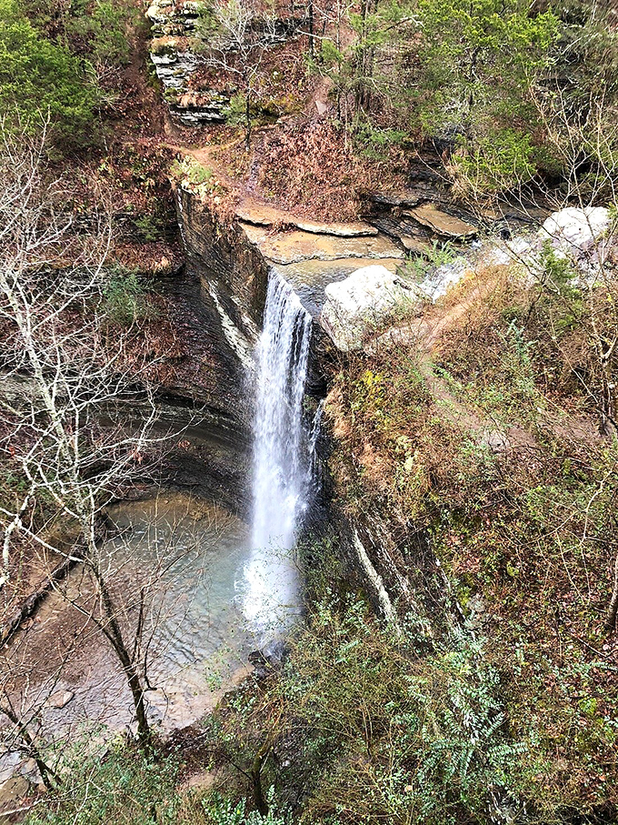 Bridal Veil Falls cascades with perfect dramatic timing, as if nature designed this waterfall specifically for your social media feed.