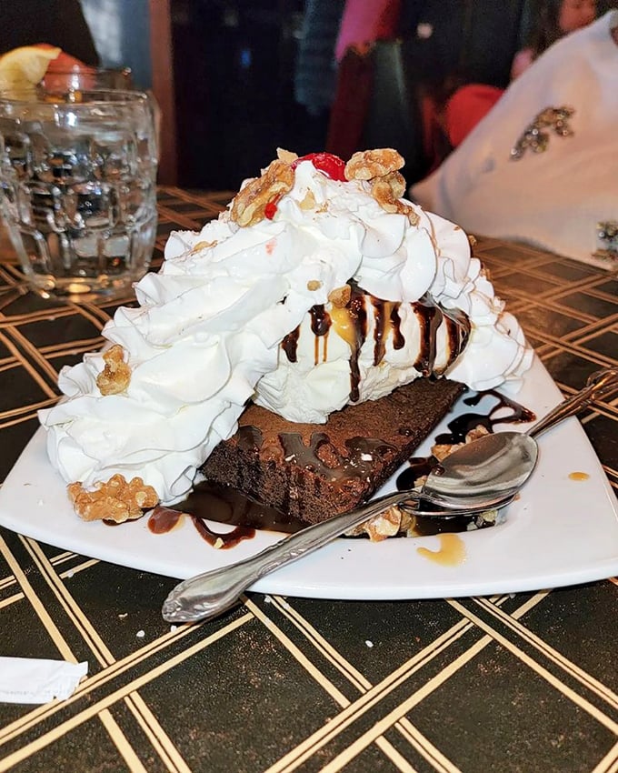 Dessert or work of art? This brownie sundae is a towering testament to the power of chocolate, cream, and throwing caution to the wind.