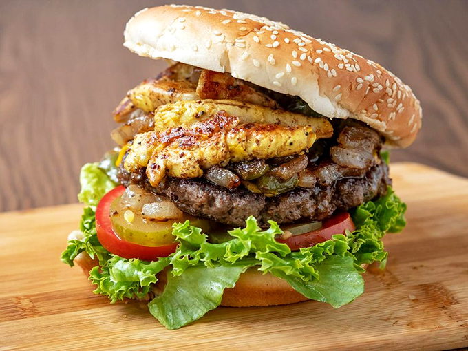 A burger stacked so perfectly it belongs in the Sandwich Hall of Fame. The pineapple adds that "why didn't I think of that?" element.