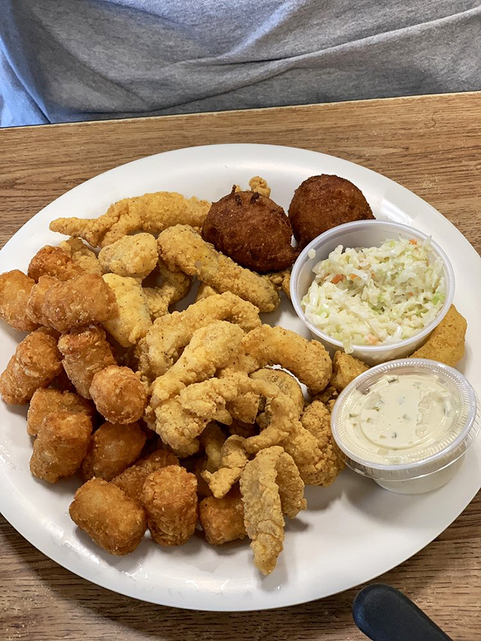 The Deep South meets the deep fryer in this epic platter. It's a crunchy, savory symphony that would make even a catfish smile.