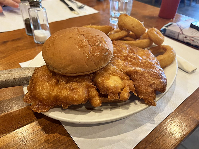 Chicken so golden, it belongs in Fort Knox! Paired with onion rings that could double as delicious life preservers.