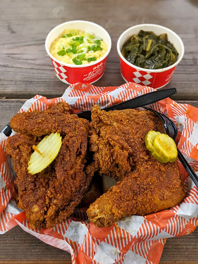 A trio of temptation! This plate of chicken, mac and cheese, and greens is like a greatest hits album for your mouth.