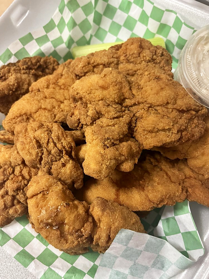 Chicken fingers that'll have you licking your own digits clean. Crispy, juicy, and worth fumbling your diet for.