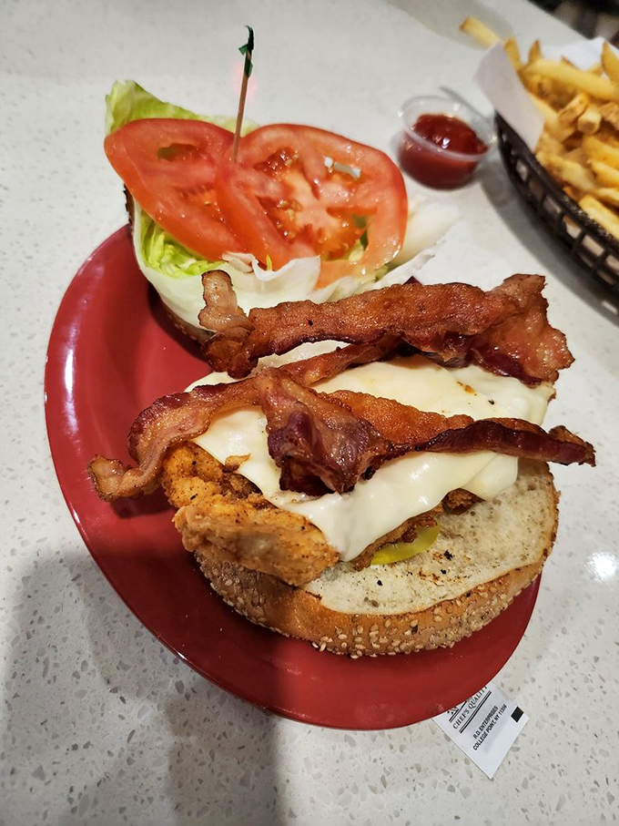 The "Big Bang Theory" of sandwiches! This bacon-topped beauty has more layers than a quantum physics textbook, and it's twice as satisfying.