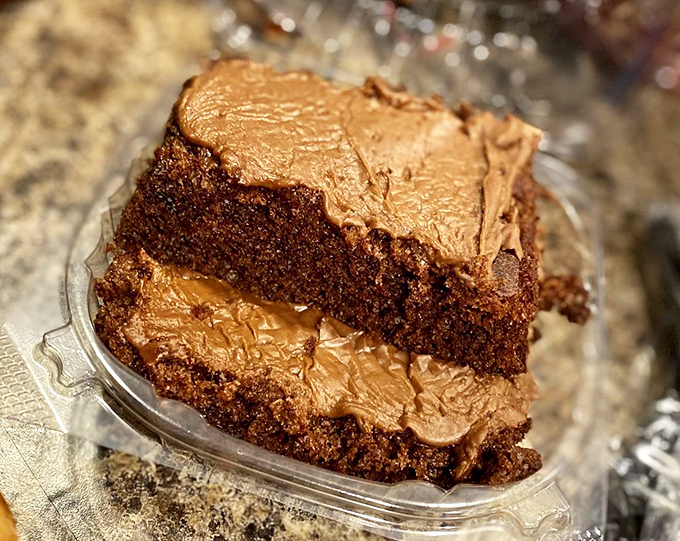 Chocolate cake or edible happiness? This slice is so decadent, it should come with its own warning label: "May cause spontaneous happy dances."
