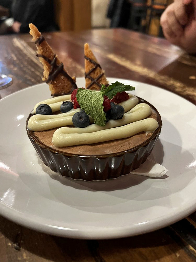 Chocolate mousse that's dressed to impress! This dessert is putting on the Ritz with its fancy toppings and "come hither" look.