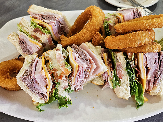 The club sandwich that puts other sandwiches to shame. Stacked higher than a Jenga tower, it's a delicious balancing act of flavors and textures.