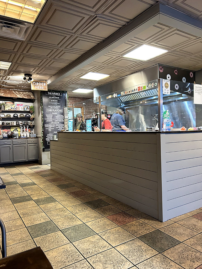 The gateway to gastronomic bliss. Approach the counter, state your desires, and prepare for donut nirvana.