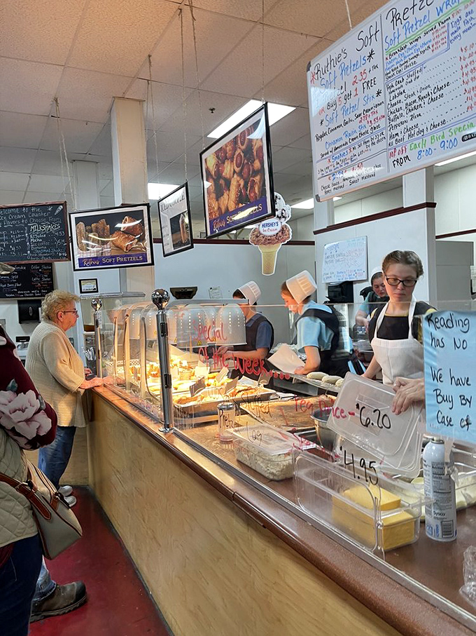 At Ruth's Soft Pretzel stand, tradition is twisted into perfection daily. Those aren't just workers&mdash;they're artisans of dough.
