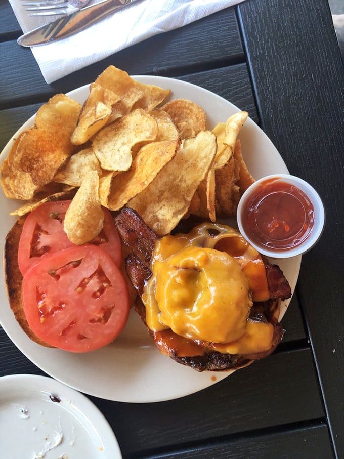 This isn't just another burger&mdash;it's a testament to the power of proper cheese meltage, bacon placement, and fresh tomato architecture.