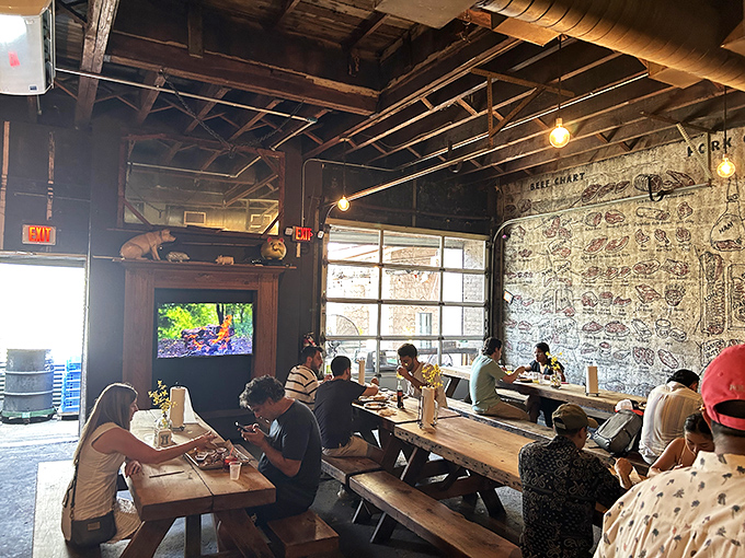 Where meat brings people together. In the church of barbecue, these wooden pews host the faithful seeking smoky salvation.
