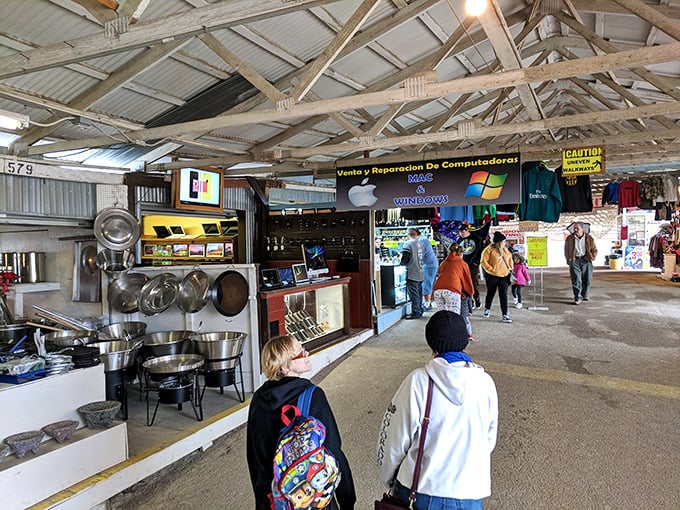 People-watching paradise! This bustling scene is a microcosm of Texas diversity, where bargain hunters of all stripes come to mingle and haggle.