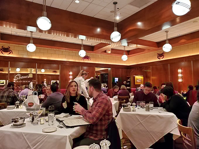 A bustling dining room that's more lively than a school of fish. Here, the chatter of happy diners mingles with the clinking of shells and glasses.