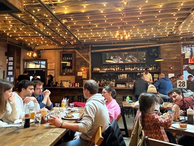 Happiness is... a table full of friends and a platter full of barbecue! These diners are living their best, sauciest lives.