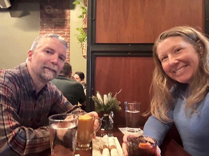 Happy diners raising glasses to good company and better food &ndash; the universal language of "this place was absolutely worth finding."