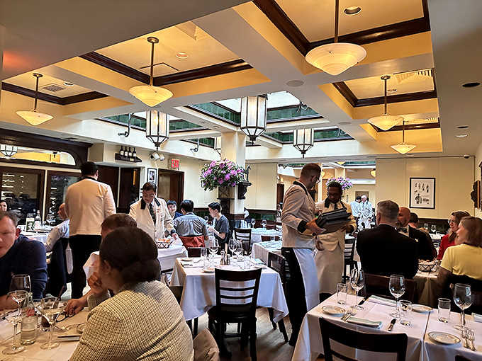 The dining room hums with the energy of celebration, tradition, and the shared understanding that dinner isn't just food&mdash;it's theater.