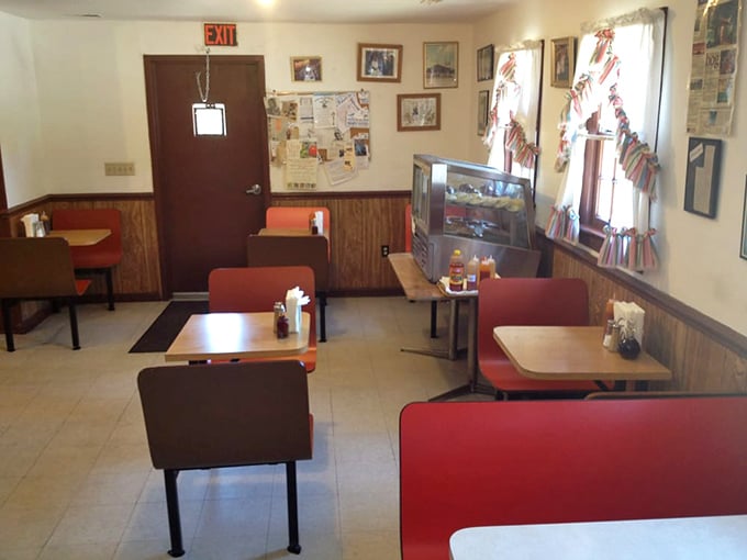 Red booths, wood paneling, and the promise of barbecue. It's like stepping into a time machine set to "delicious."