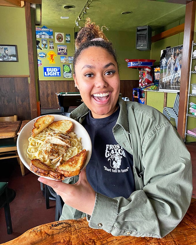 Meet your new best friend: the person who brings you delicious food and a smile. She's not wearing a cape, but she's definitely a hero.