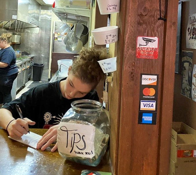 Behind every great barbecue joint is a team of unsung heroes. This hardworking staff member is the secret ingredient in Chicken N More's recipe for success.
