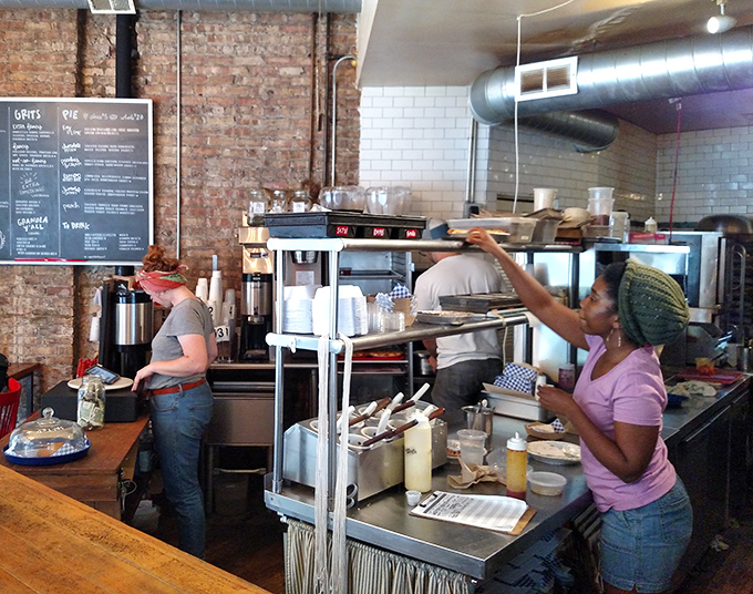 The kitchen crew, working their magic like culinary wizards. These are the unsung heroes behind your food coma.