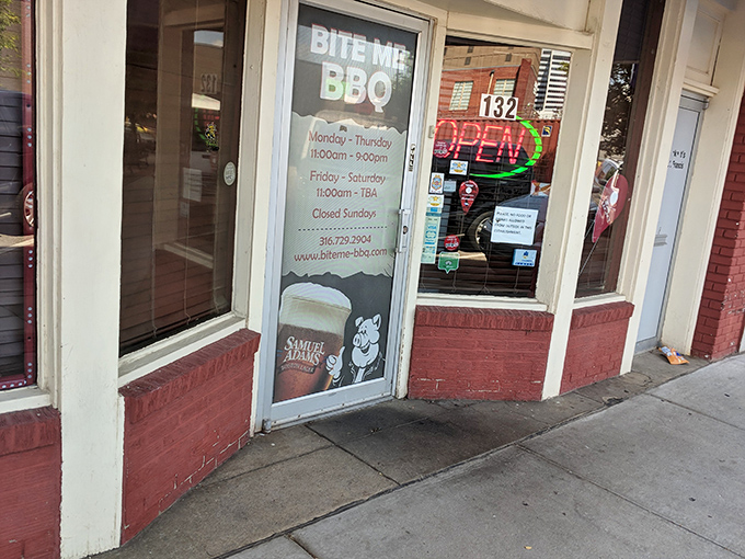 The gateway to gastronomic bliss! This unassuming entrance leads to a world where smoke and spice reign supreme.