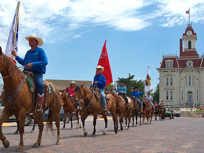 The Flint Hills Rodeo Parade marches past the courthouse, a tradition that's been bringing the community together since 1937.