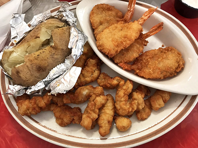 The catch of the day? A plateful of crispy, golden happiness! These fried shrimp and clams are like a seaside vacation for your taste buds.
