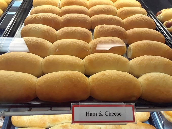 Ham and cheese, please! These golden buns are like little treasure chests filled with savory delights.