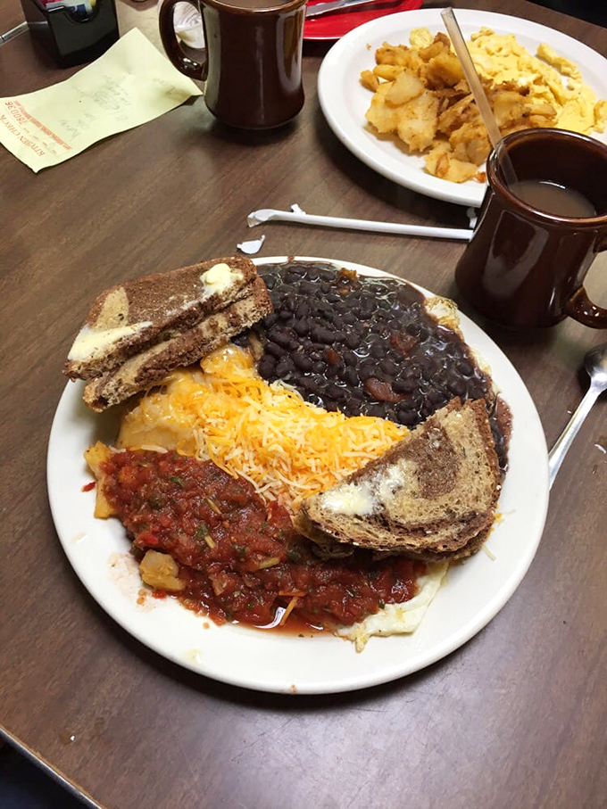 A fiesta on a plate! These huevos rancheros are doing the breakfast salsa, and your taste buds are invited to dance.
