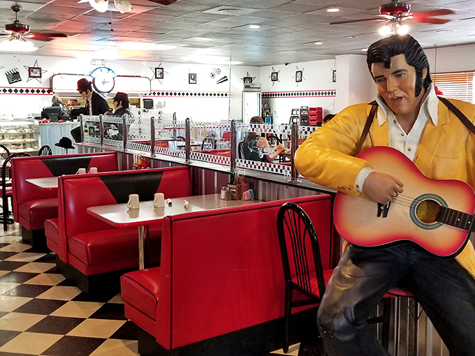 The King lives on... in statue form, at least. Elvis is in the building, and he's eyeing your cheeseburger.