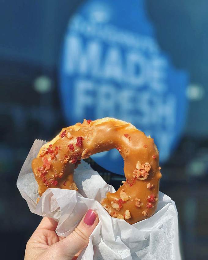The maple bacon donut: where breakfast meets dessert in a union so perfect, it could bring world peace.