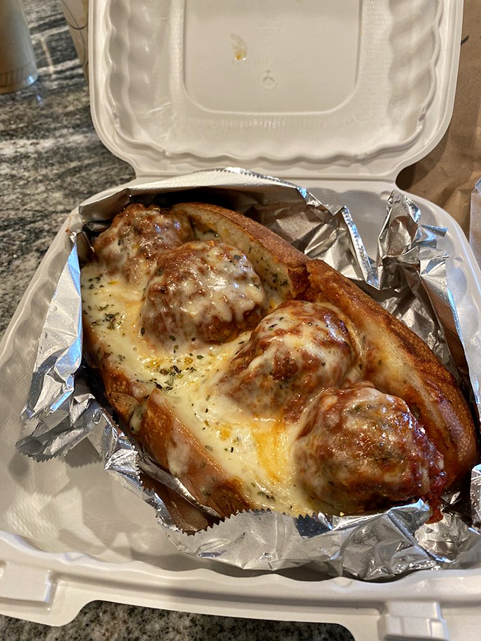 The Meatball Parmesan Sub: Where comfort food gets a promotion! These saucy spheres of joy nestled in melted cheese are a hug for your taste buds.