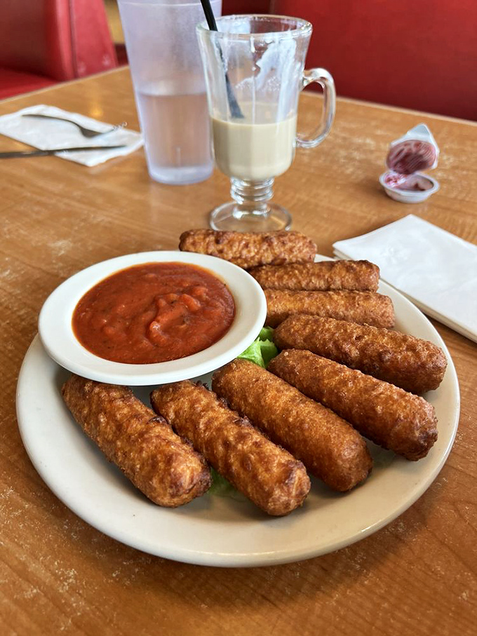 Crispy on the outside, gooey on the inside. These mozzarella sticks are like edible magic wands, turning hunger into happiness with every bite.
