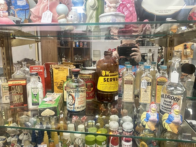 Bottled nostalgia on display. From snake oil to soda pop, these vintage containers are a time capsule of consumer history.
