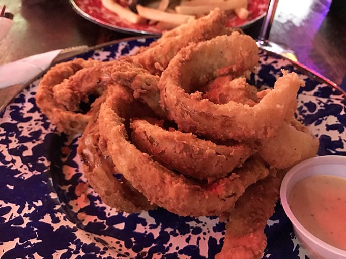 Oh my, what big rings you have! These crispy, golden onion rings are the stuff of deep-fried dreams. Dunk 'em if you got 'em!