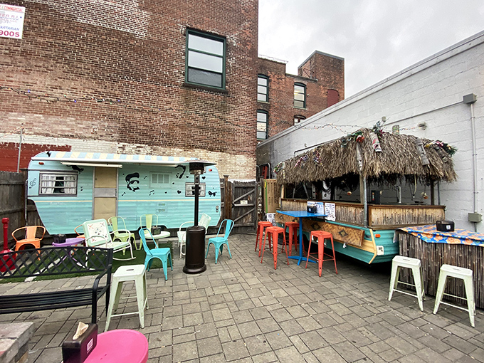 Who needs a time machine when you've got this outdoor bar? It's retro relaxation at its finest, complete with a camper that's seen more stories than a library.