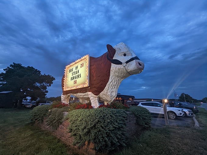 Is it a cow? Is it a sign? No, it's super steer! This bovine beacon guides hungry travelers to beefy paradise.