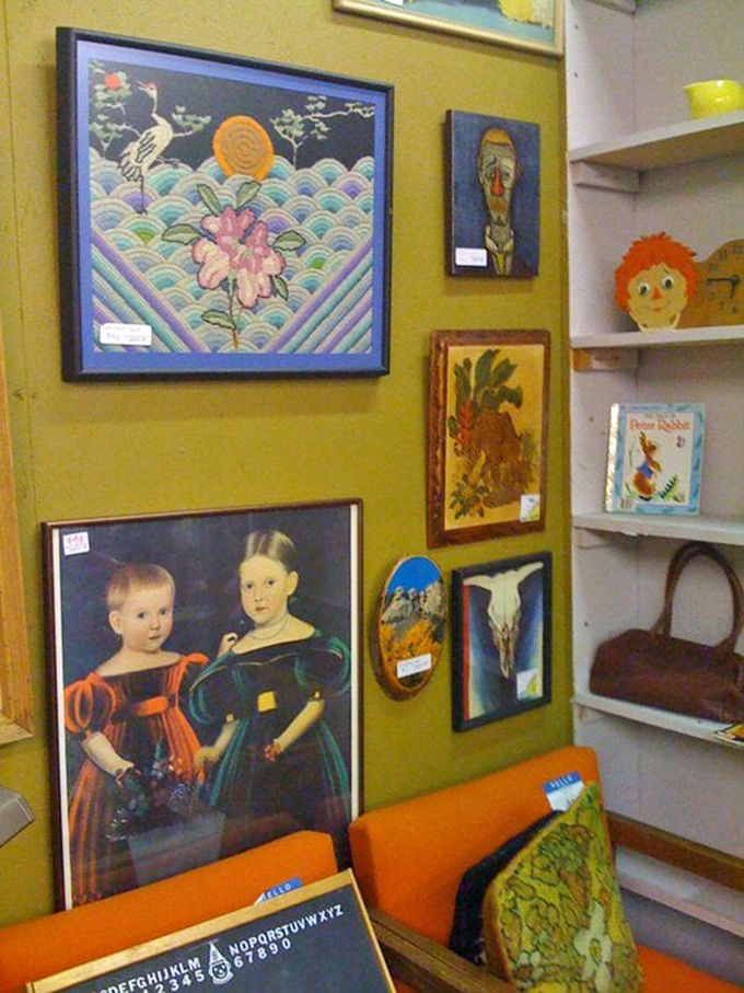 Art from different eras creates a gallery wall that's part museum, part garage sale, wholly captivating with its eclectic visual storytelling.