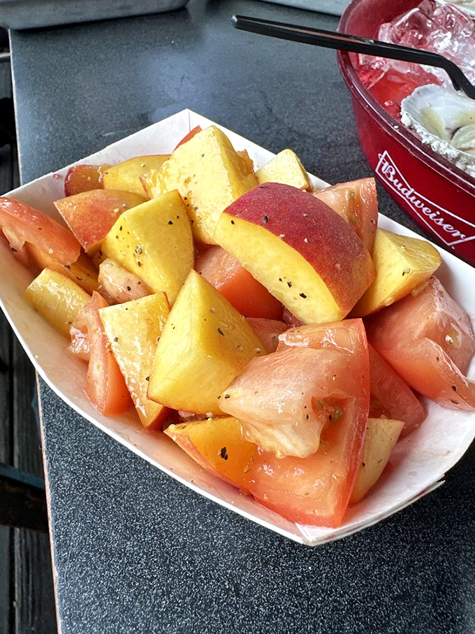 A salad that tastes like summer sunshine. Juicy peaches and tomatoes playing nice - who knew vegetables could be this fun?