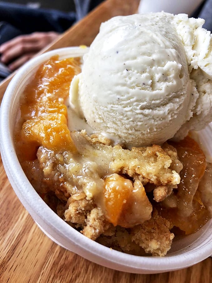 Peach cobbler &agrave; la mode: Because after all that meat, you need a "light" dessert. It's practically a fruit salad, right?