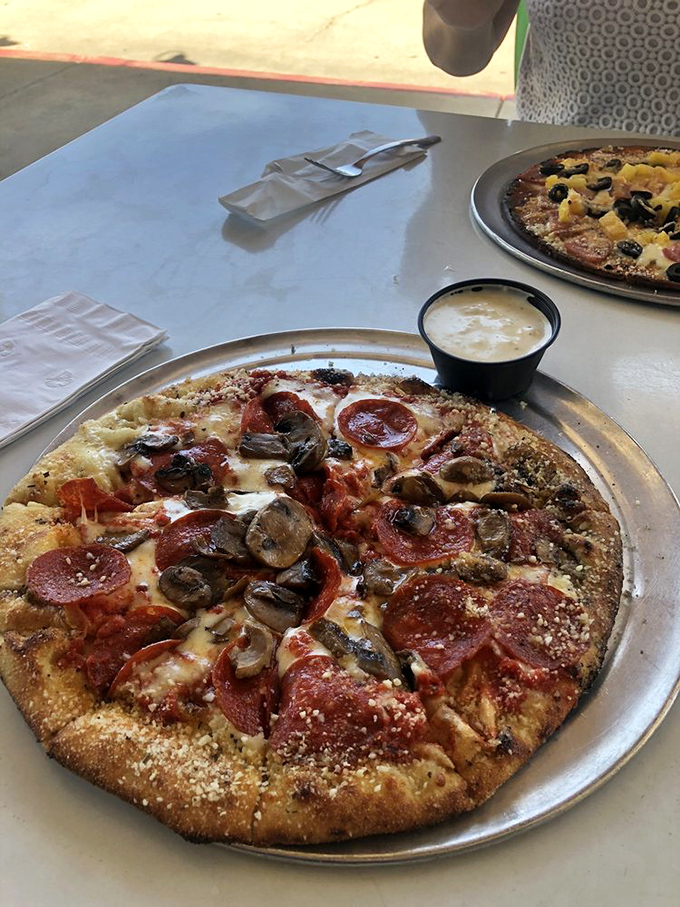 Pepperoni and mushroom with a side of ranch: A classic combo that never goes out of style. It's the pizza equivalent of a perfectly tailored suit.