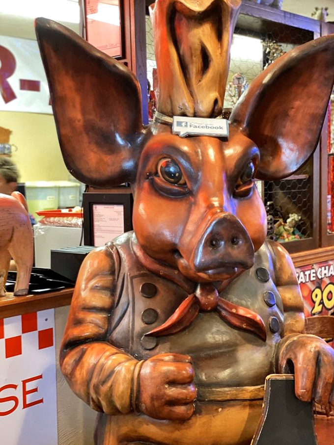 Meet the unofficial greeter, a pig statue with more personality than some Hollywood stars. No autographs, please!