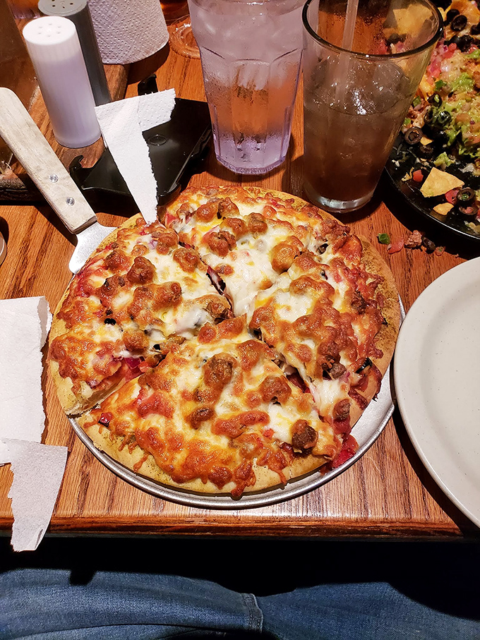 Pizza that's cheesier than your dad's best jokes. Each slice is a little round of happiness that'll make you forget about your diet.