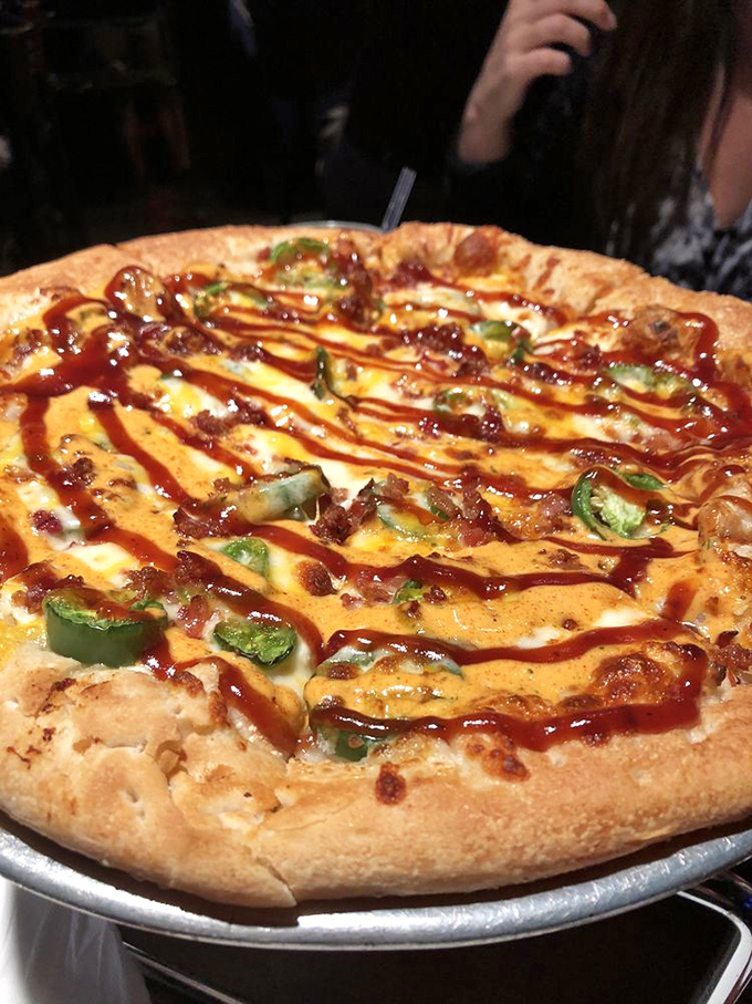 This pizza is so loaded, it's like a flavor explosion on a crust. It's not delivery, it's de-licious!