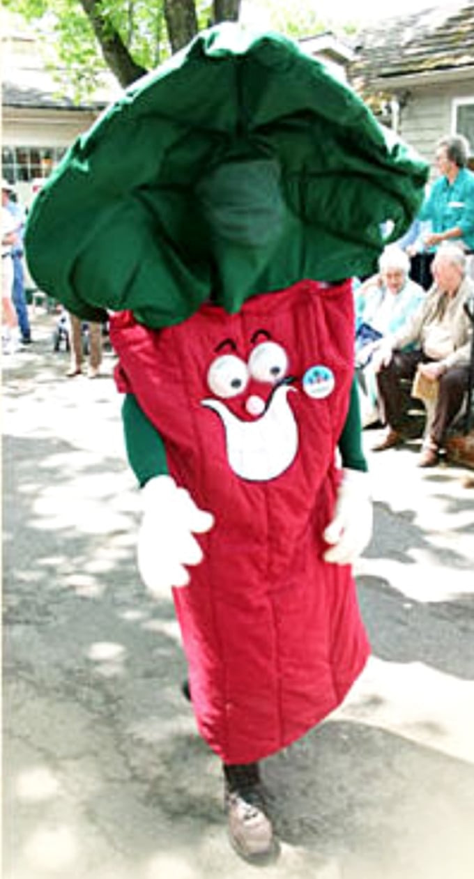 Berry good times! The Rhubarb Festival's mascot is so adorably corny, you can't help but smile (and crave pie).