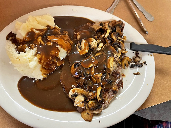 A carnivore's dream come true! This juicy steak, paired with a mountain of mushrooms, is breakfast fit for a champion.