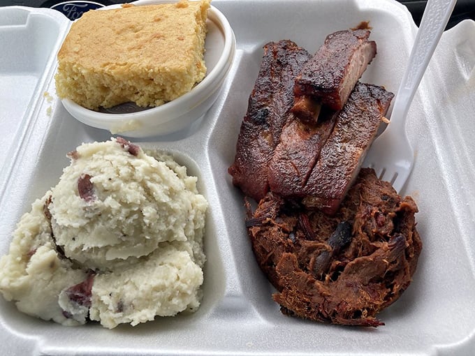 The holy trinity of BBQ! Ribs, pulled brisket, and sides &ndash; it's like the Avengers assembled on your plate, ready to save your appetite.