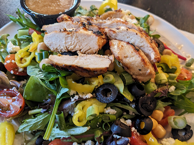 A salad that eats like a meal! Fresh greens, grilled chicken, and a rainbow of veggies. Who said healthy can't be hearty?