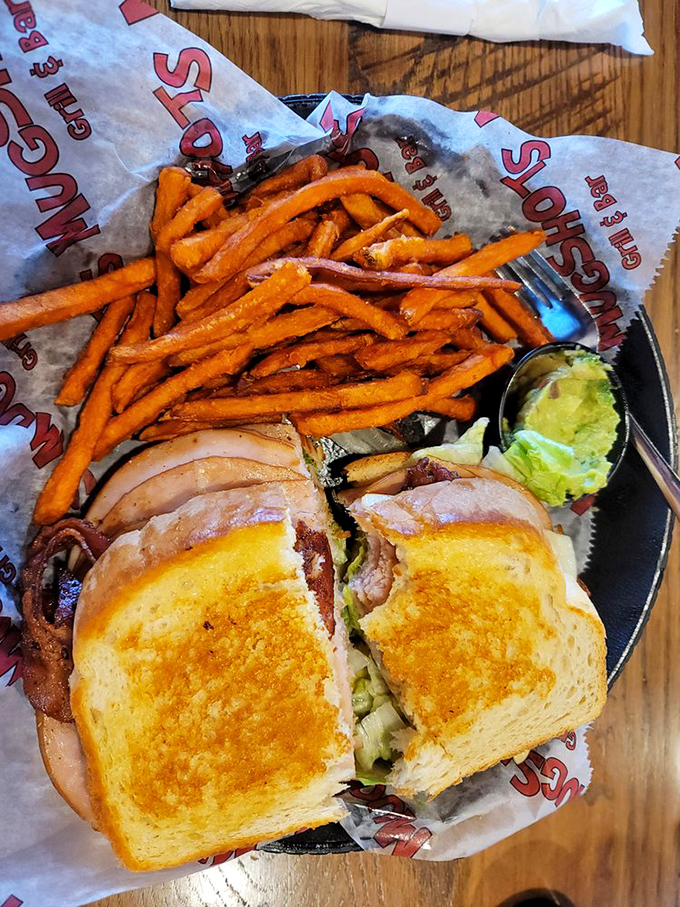 The sandwich that ate Manhattan! Golden-toasted bread hugging a mountain of fillings – it's a hand-held flavor explosion.