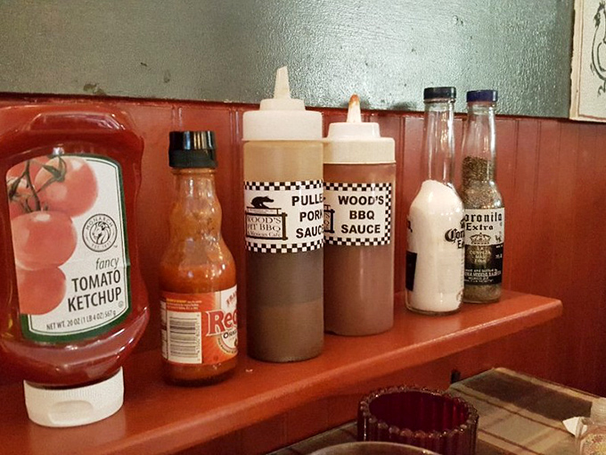 Sauce boss central! Wood's homemade BBQ sauces are the secret weapons that'll turn your meal into a flavor explosion.